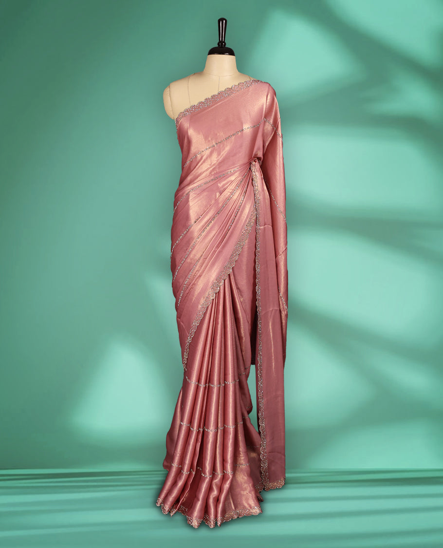Pastel Pink colour shimmer fancy saree adorned with subtle horizontal
