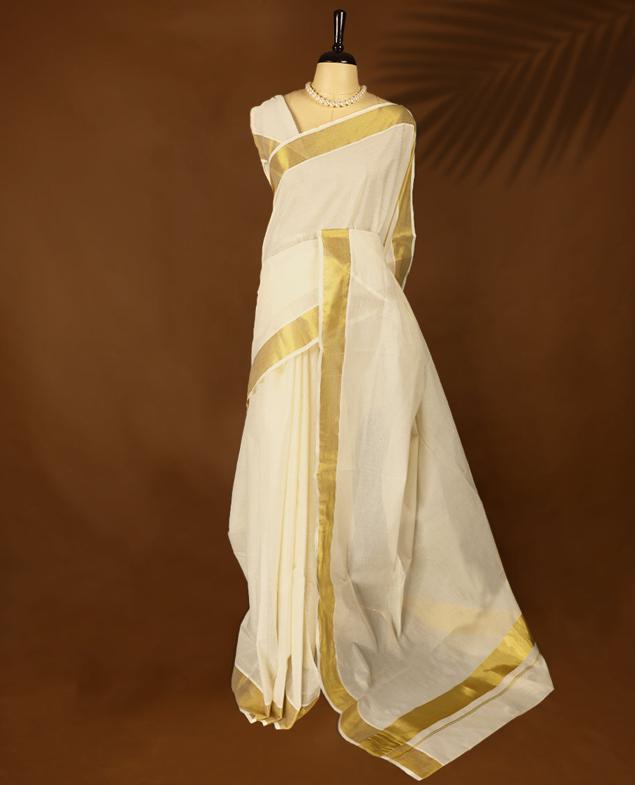 Kerala cotton saree with Plain Body and Golden border with Matching Bl